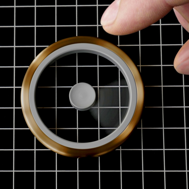 Mezmocoin Phantom- Optical illusion desk toy by MEZMOGLOBE - Indiegogo